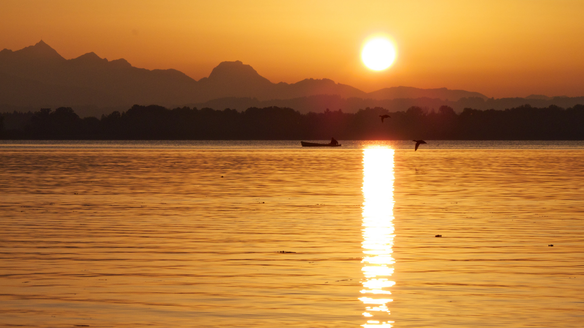 Sundowner bei Übersee Foto & Bild | sonnenuntergänge, himmel ...